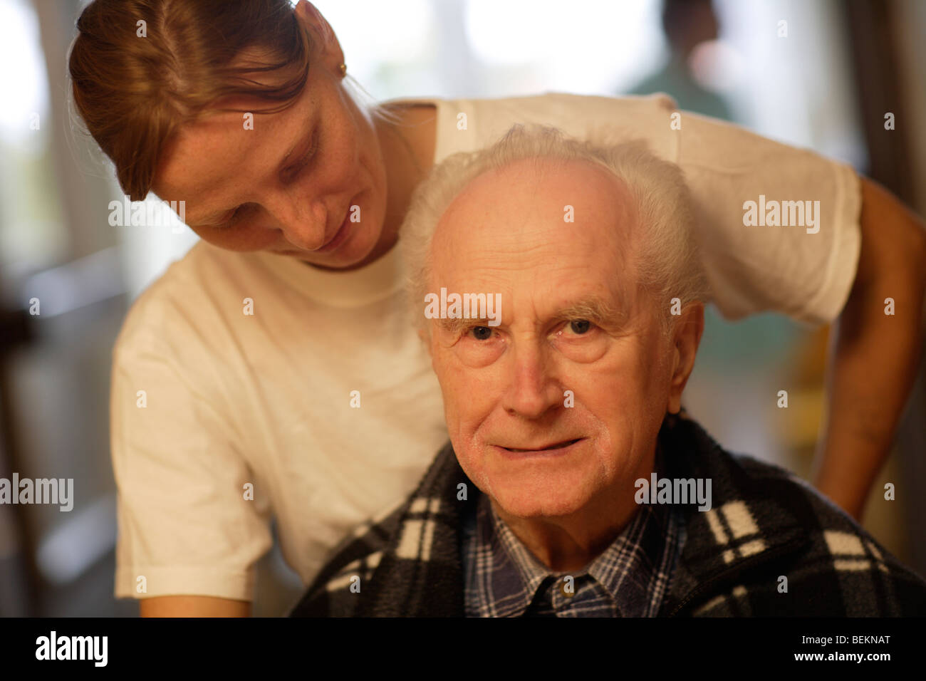 invalid man in wheelchair with female therapist Stock Photo - Alamy