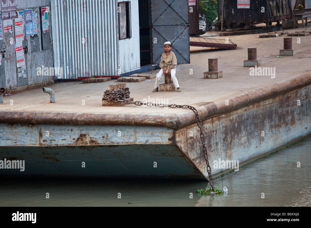 Muslim boy waiting on the dock for the Rocket Paddle Boat on the ...