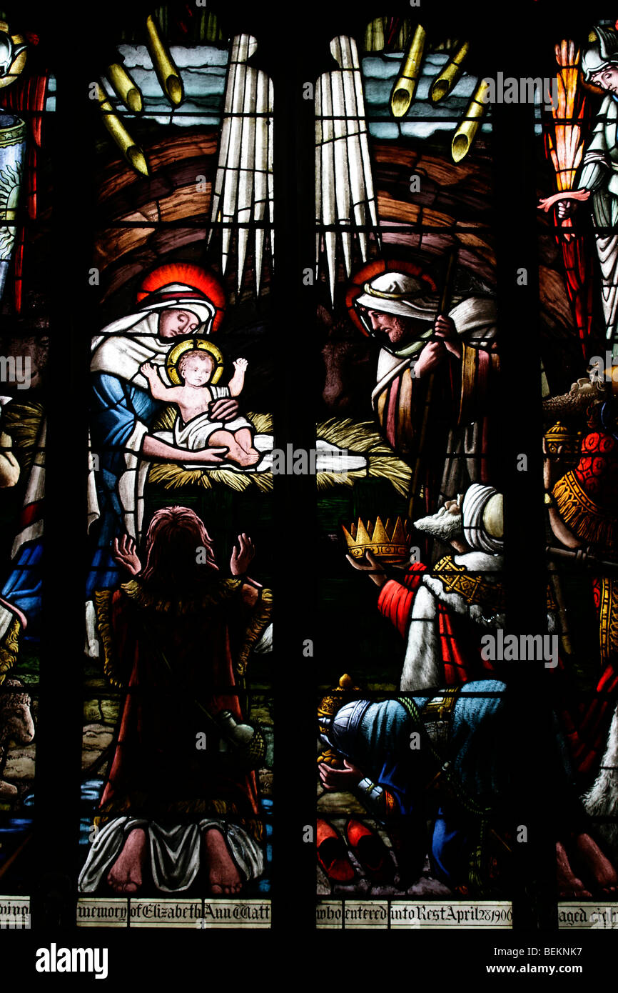 Detail from a stained glass window depicting The Nativity; Adoration of ...