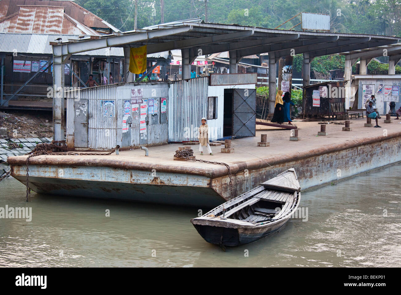 Muslim boy waiting on the dock for the Rocket Paddle Boat on the ...