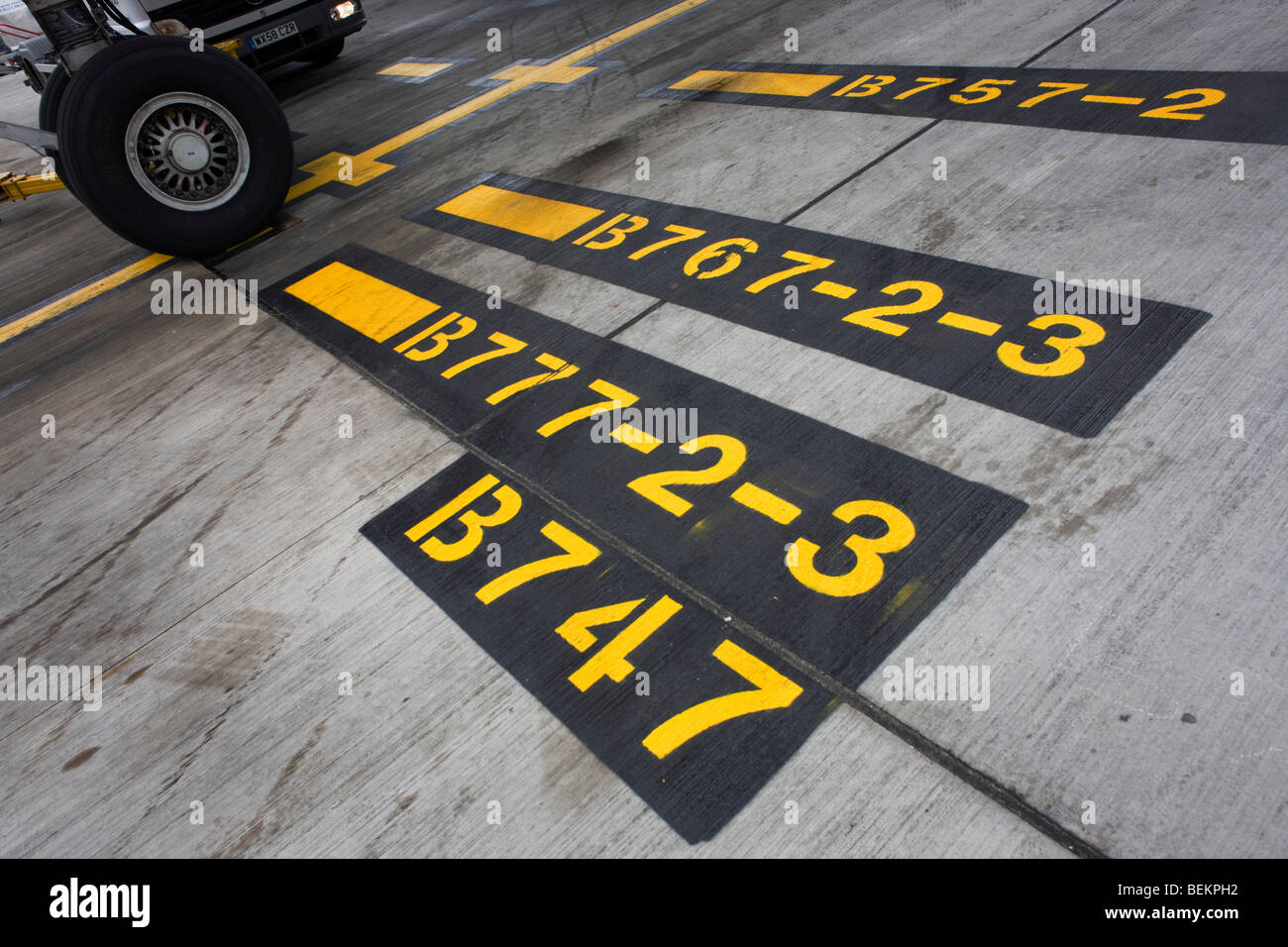 The main nose wheel of a British Airways 747 airliner is parked on its ...