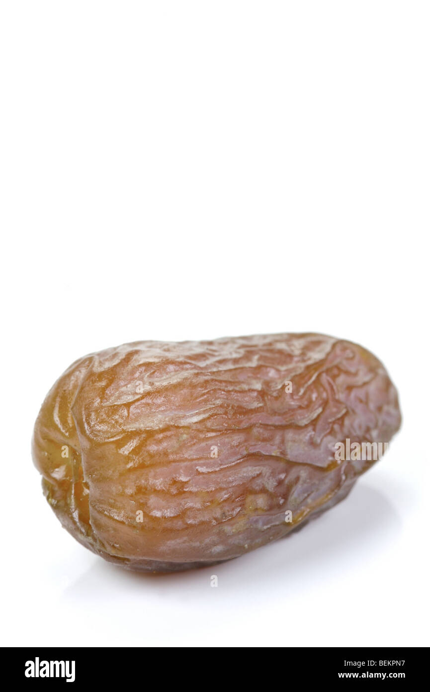 Dates isolated against a white background Stock Photo - Alamy