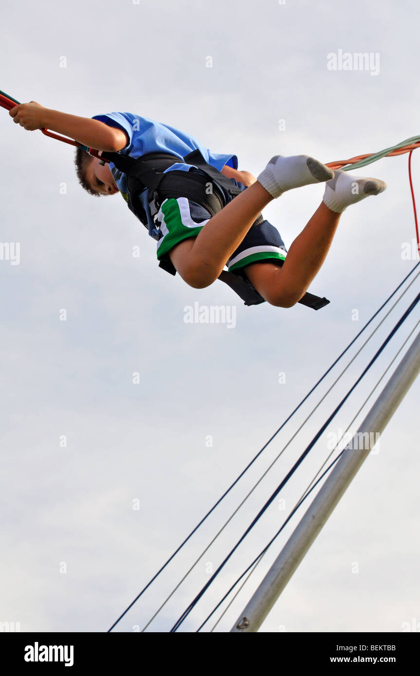 Boy on Euro bungee Stock Photo - Alamy