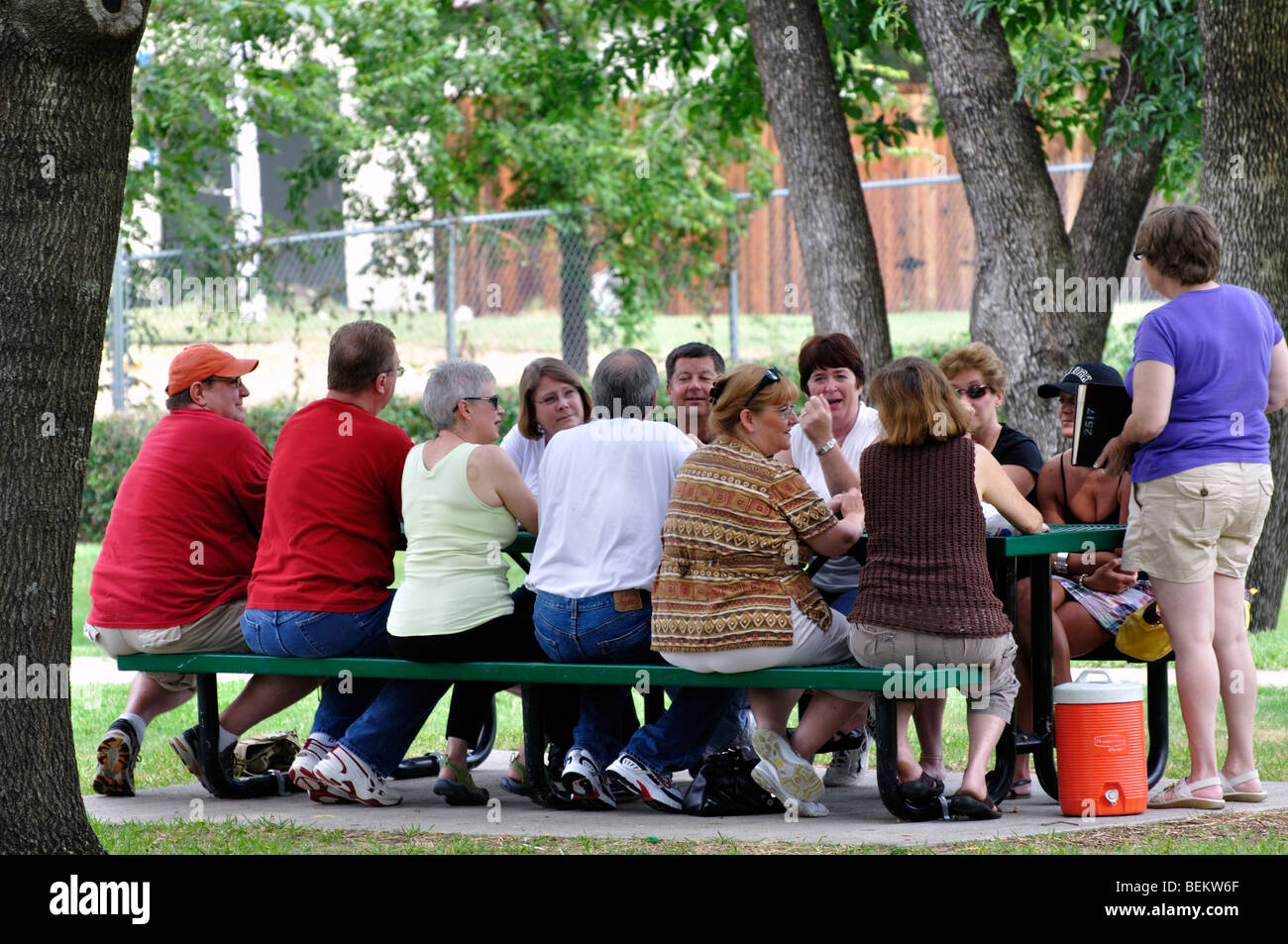 Informal business meeting in park Stock Photo - Alamy