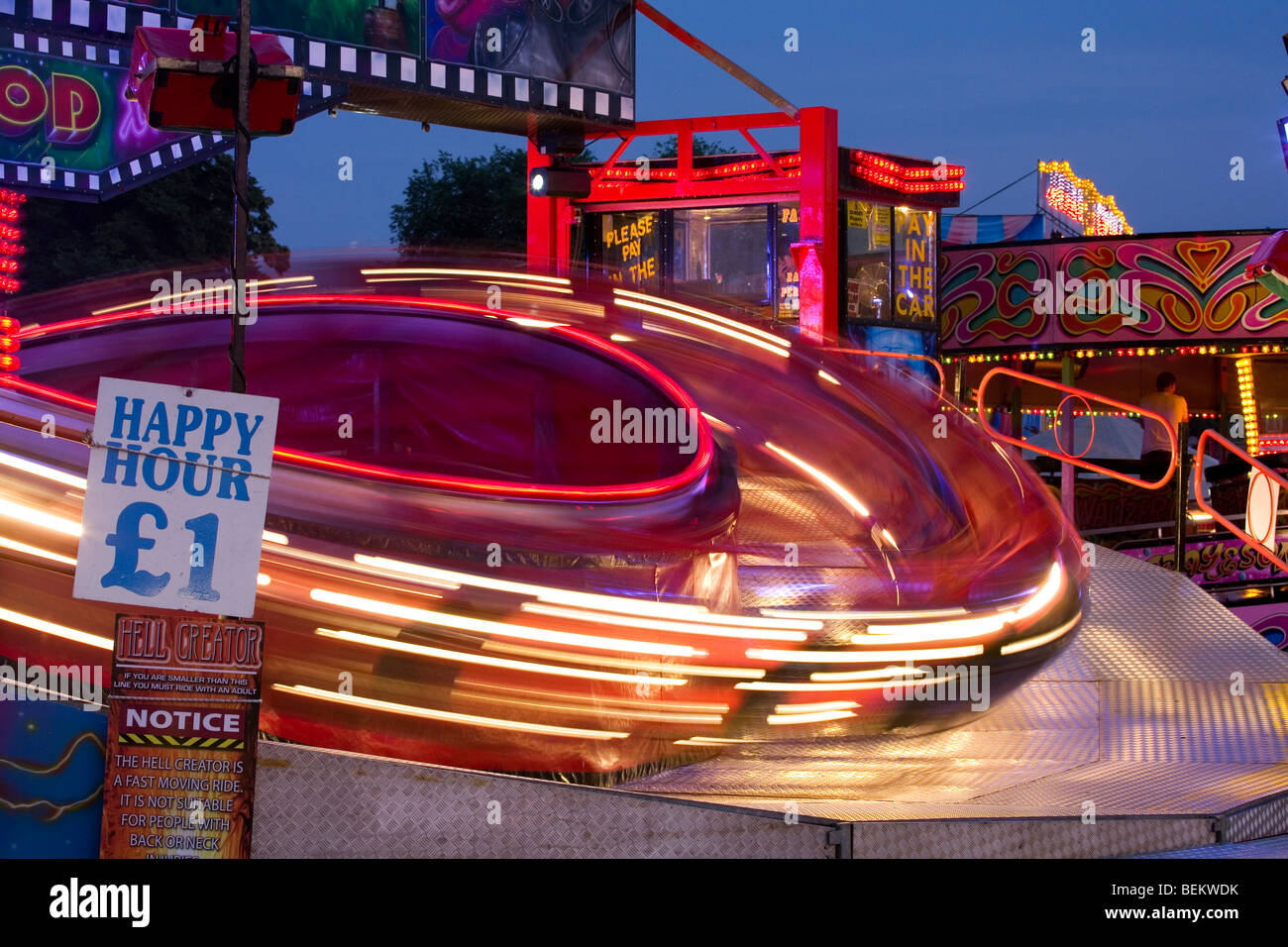 Hell Creator - Matterhorn Ride in motion at night. Midsummer Fair ...