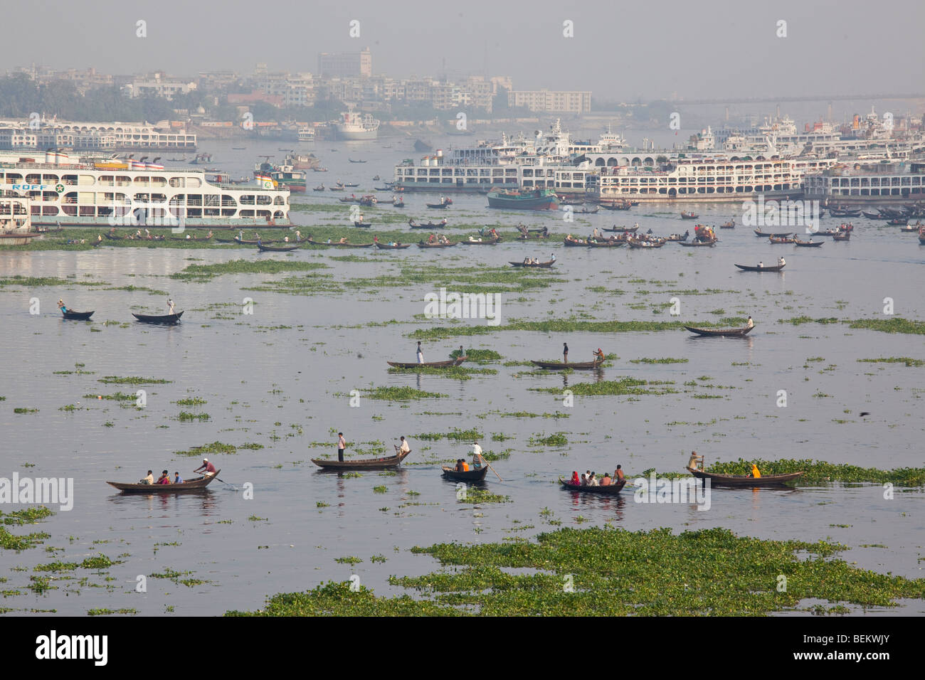 Dingi Nouka or small rowboat taxis on the Buriganga River in Dhaka ...
