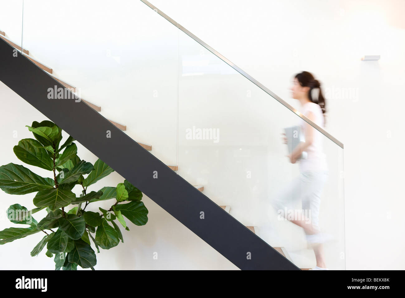 Climbing up the stairs Stock Photo - Alamy