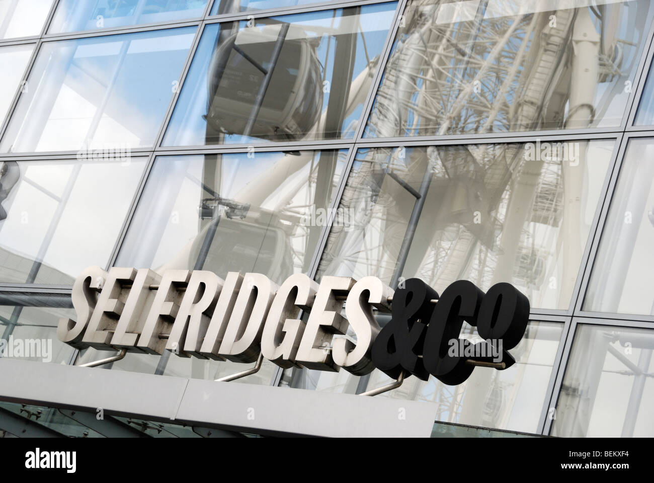 The Wheel of Manchester reflected in Selfridges department store in ...
