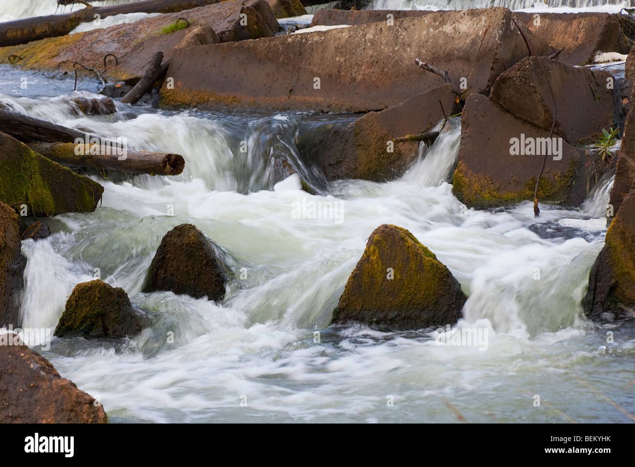 water fall through crashed stones and constructions Stock Photo - Alamy