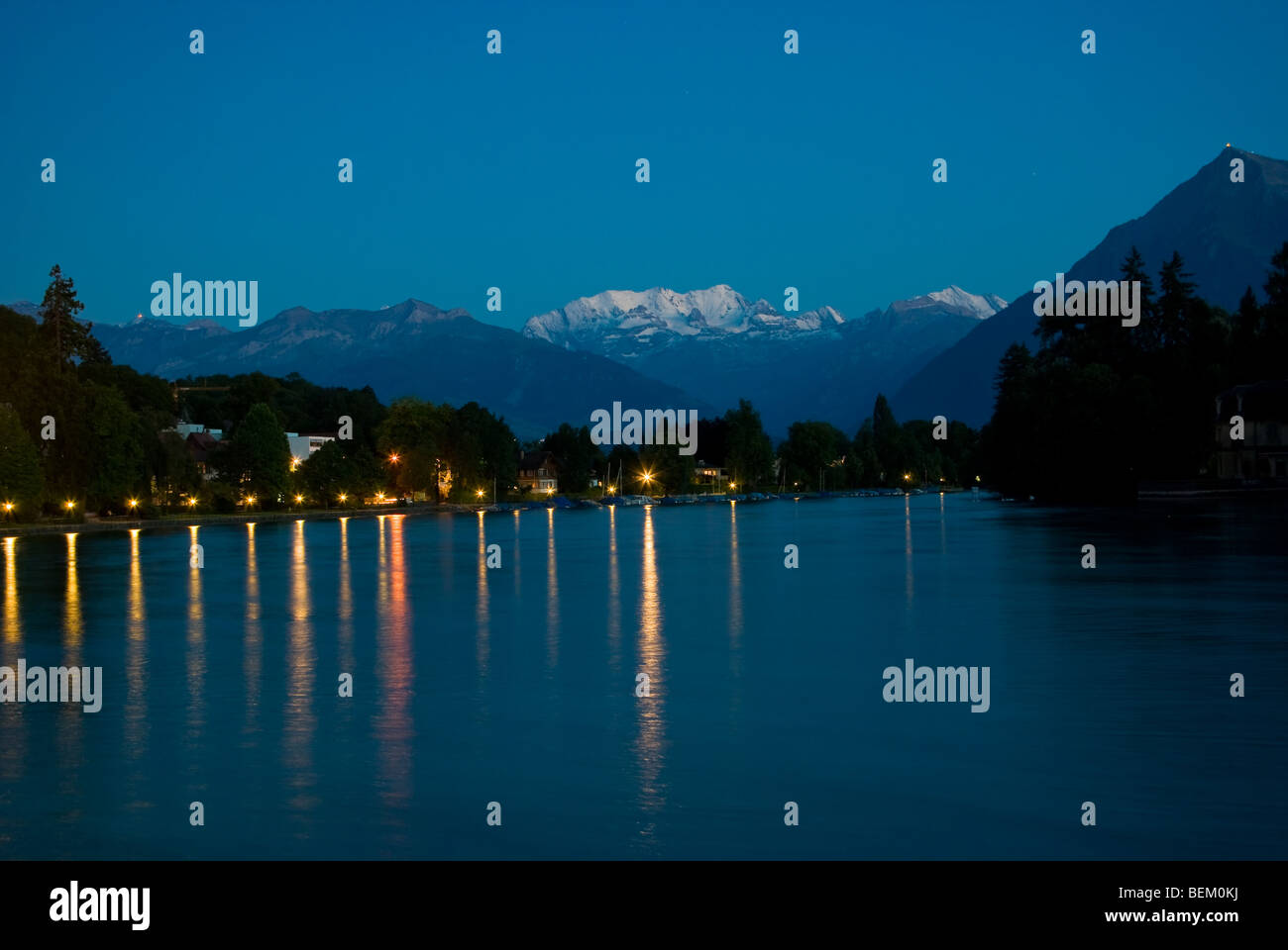 Lake Thun in the Swiss town of Thun. Alps mountains. Thunersee. Tourism ...