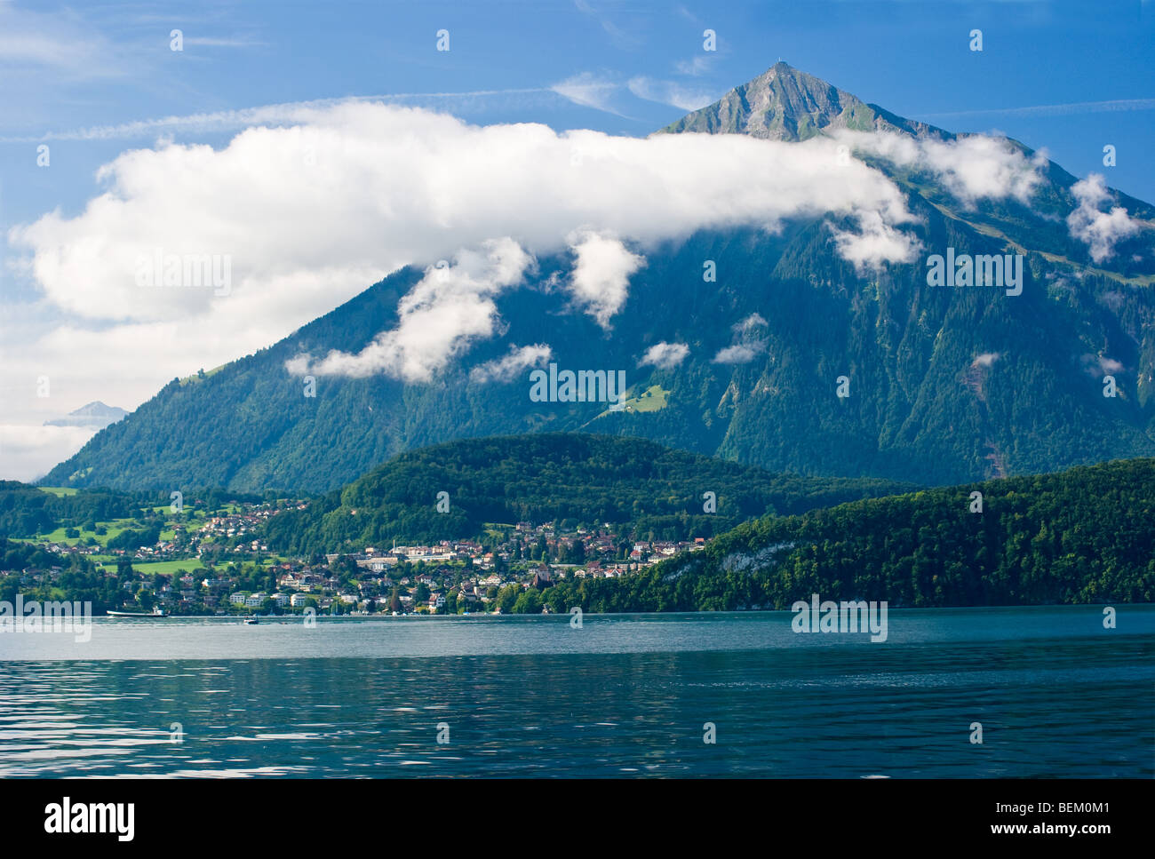 Lake Thun in the Swiss town of Thun. Alps mountains. Thunersee. Tourism ...