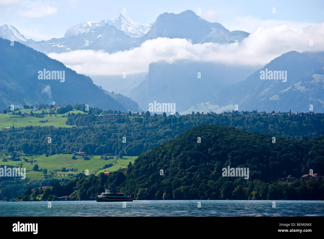 Lake Thun in the Swiss town of Thun. Alps mountains. Thunersee. Tourism ...