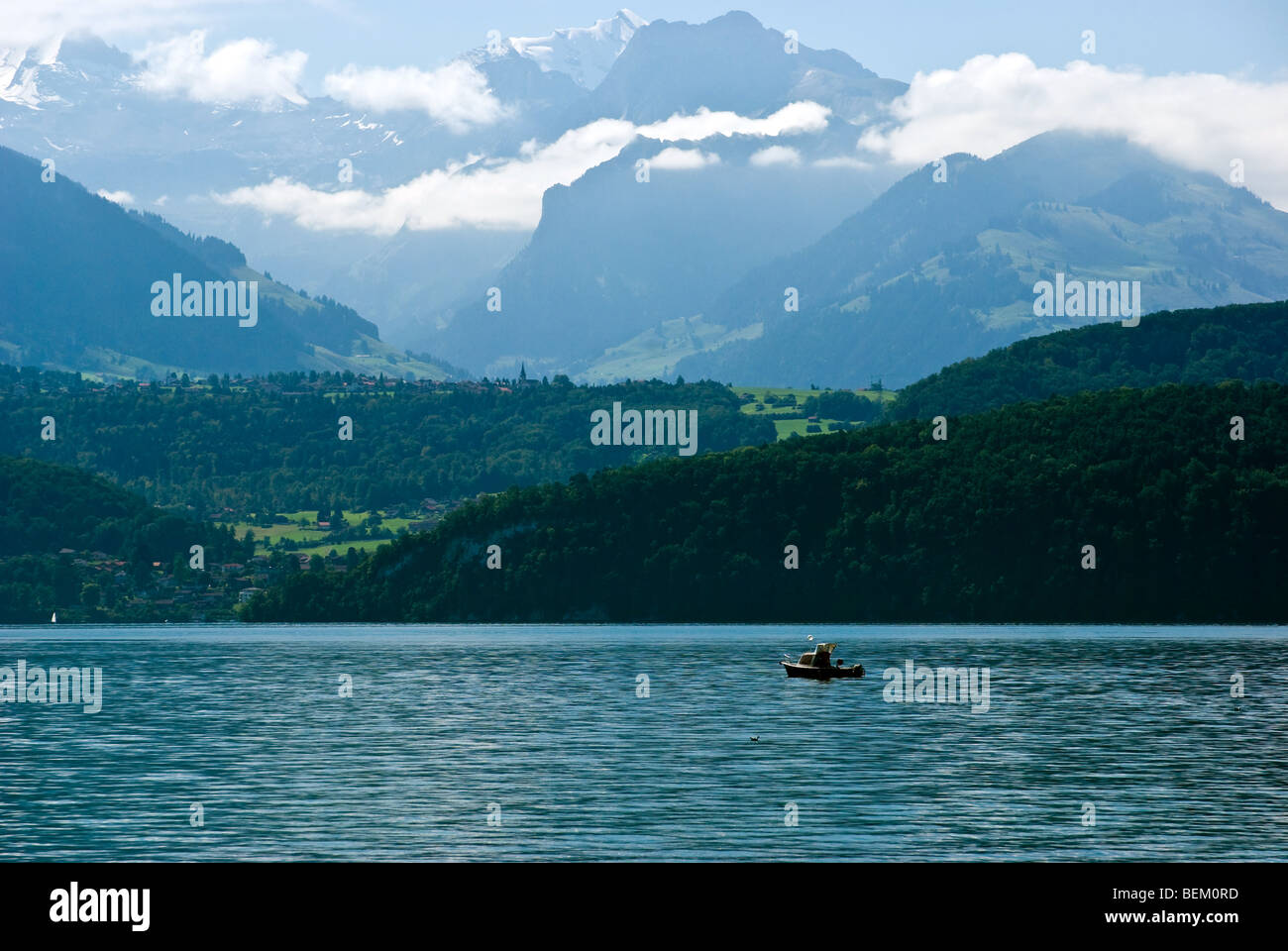 Lake Thun in the Swiss town of Thun. Alps mountains. Thunersee. Tourism ...