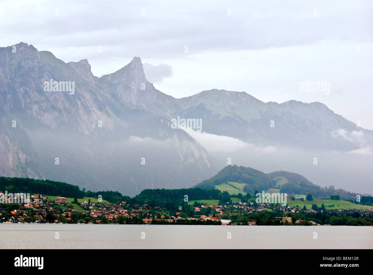 Lake Thun in the Swiss town of Thun. Alps mountains. Thunersee. Tourism ...