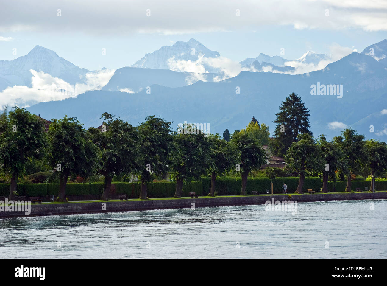 Lake Thun in the Swiss town of Thun. Alps mountains Thunersee. Tourism ...