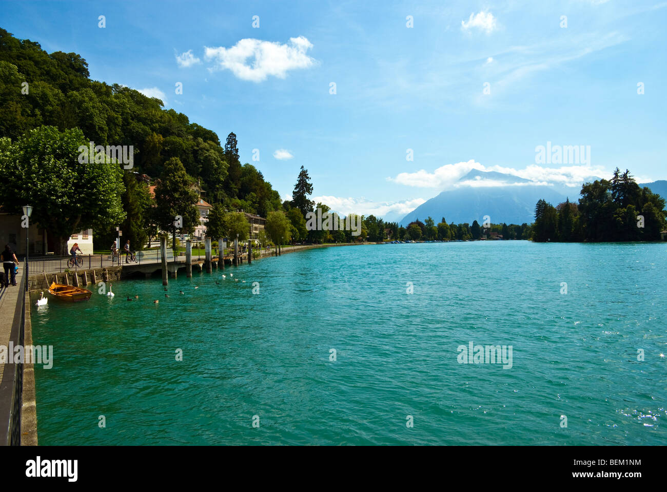 Lake Thun in the Swiss town of Thun. Alps mountains. Thunersee. Tourism ...