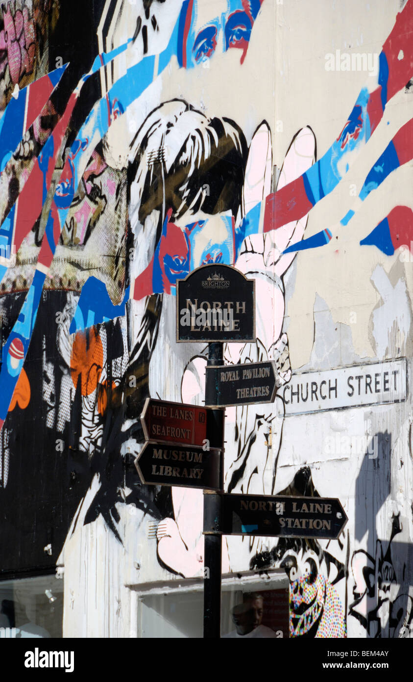 Street signs and street art in Church Street, North Laine, Brighton ...