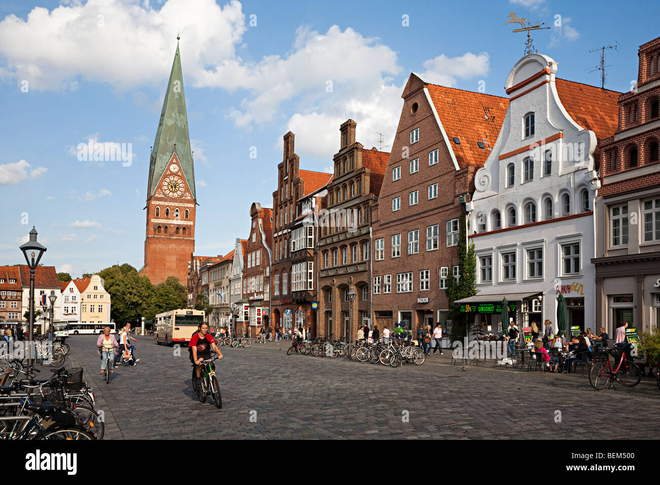 Leaning tower of St Johannis church and Am Sande road Luneburg Germany ...