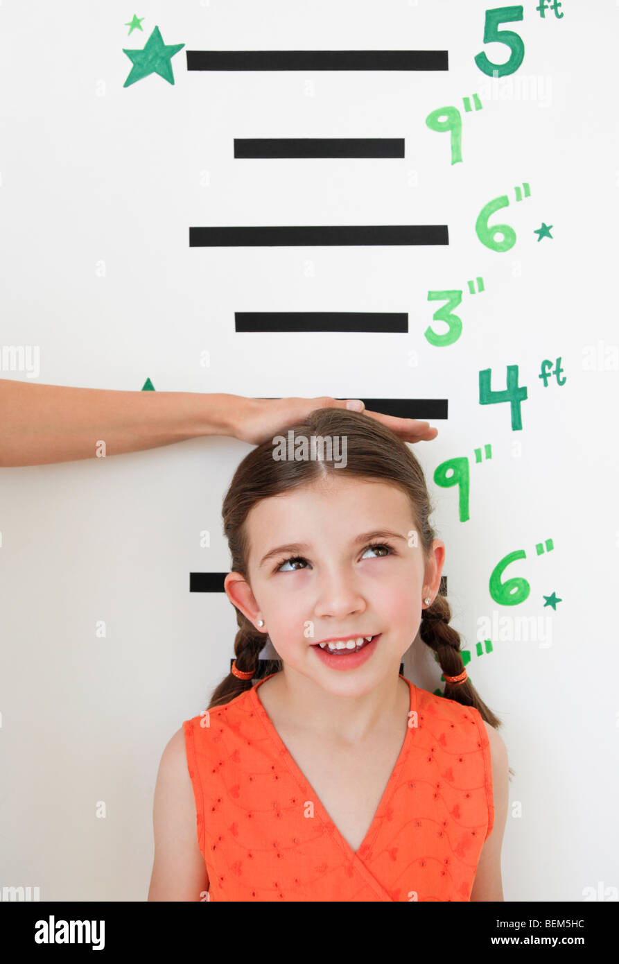 Height measured child hi-res stock photography and images - Alamy