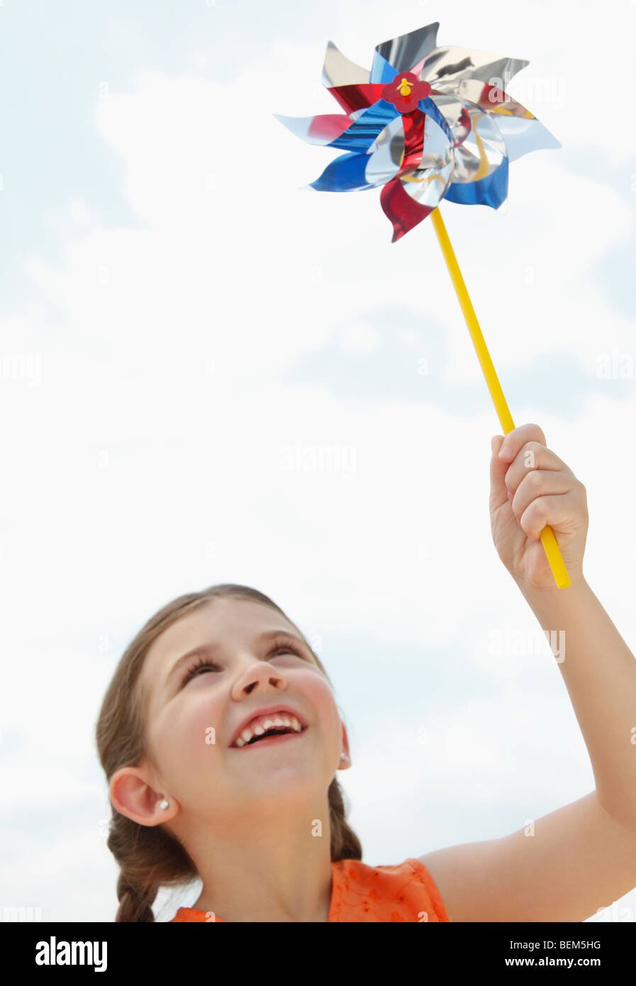 Child with pinwheel Stock Photo - Alamy