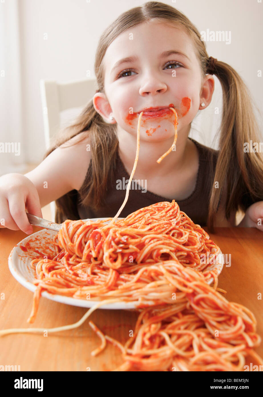 Kid Eating Pasta