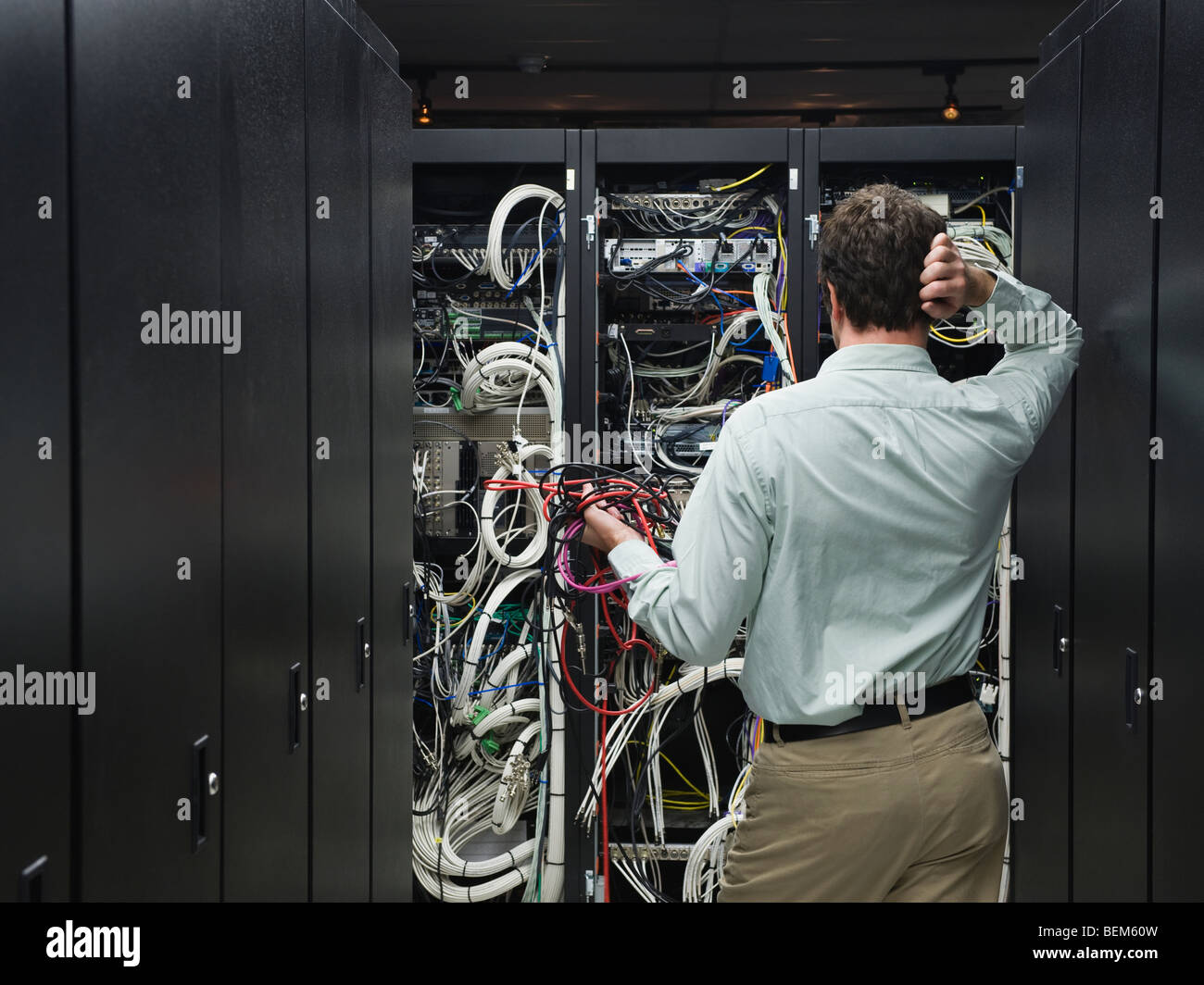 Man working in data center Stock Photo - Alamy Man working in data center Stock Photo - Alamy