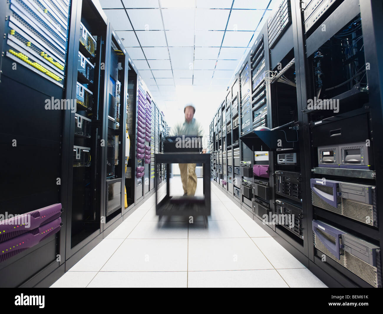 Man working in data center Stock Photo - Alamy