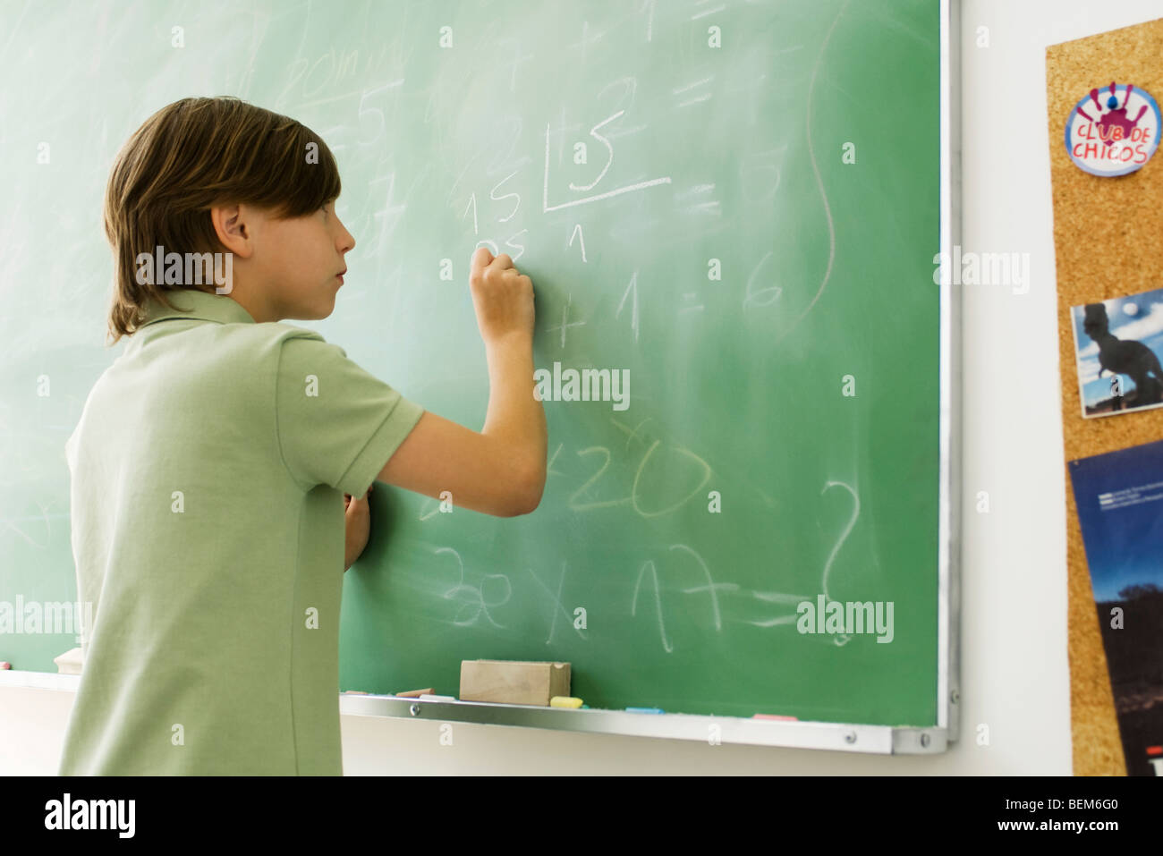 Preteen boy writing on hi-res stock photography and images - Alamy