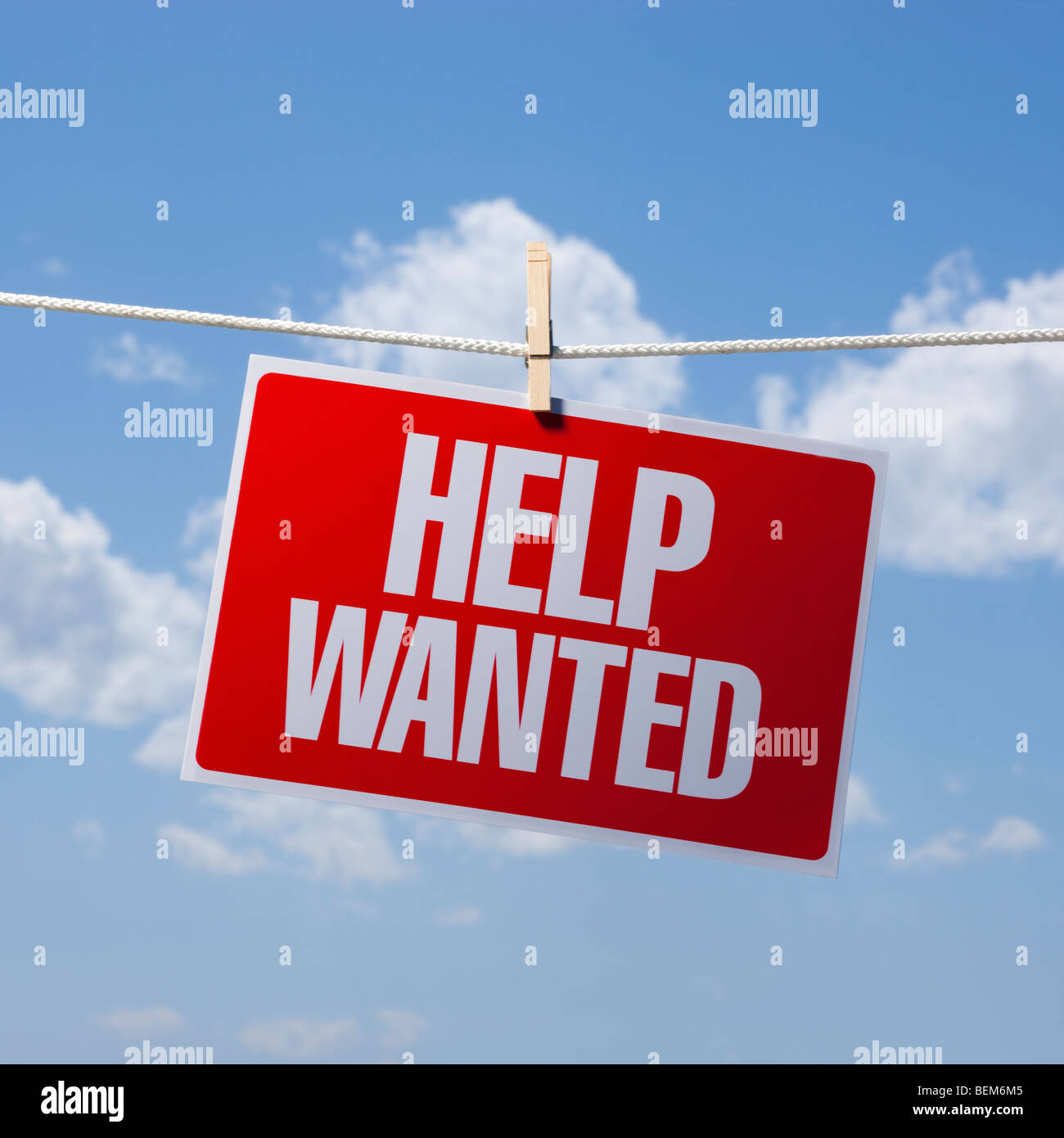 Help wanted on clothes line Stock Photo - Alamy