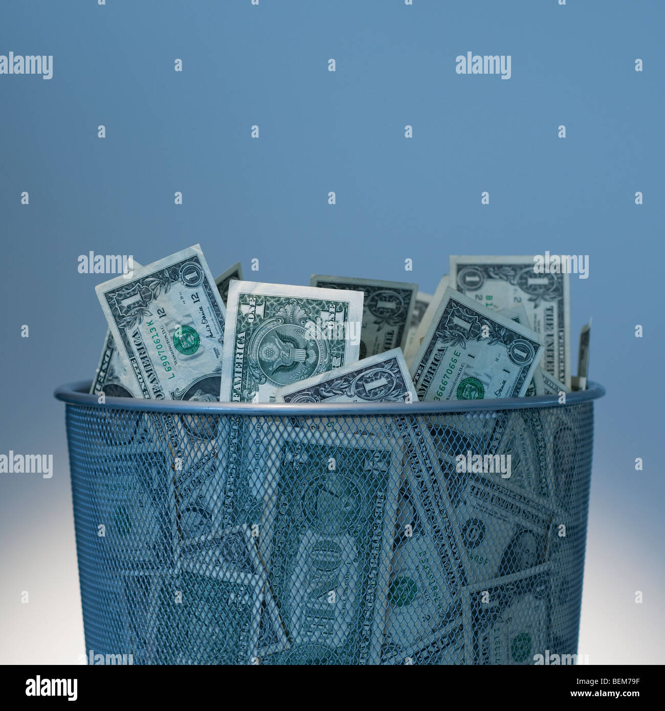 Basket of money Stock Photo - Alamy