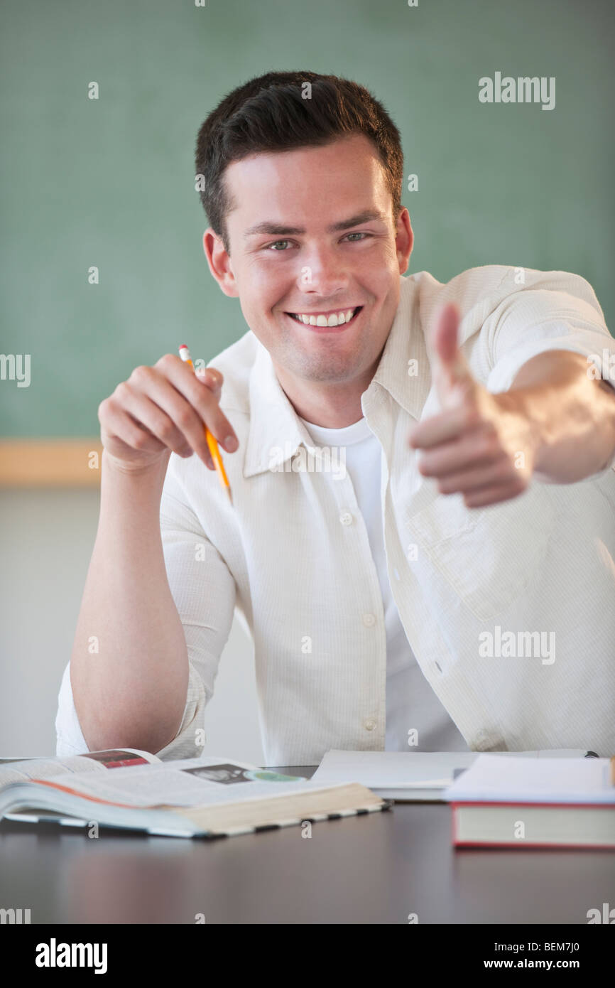 Male student smiling Stock Photo - Alamy