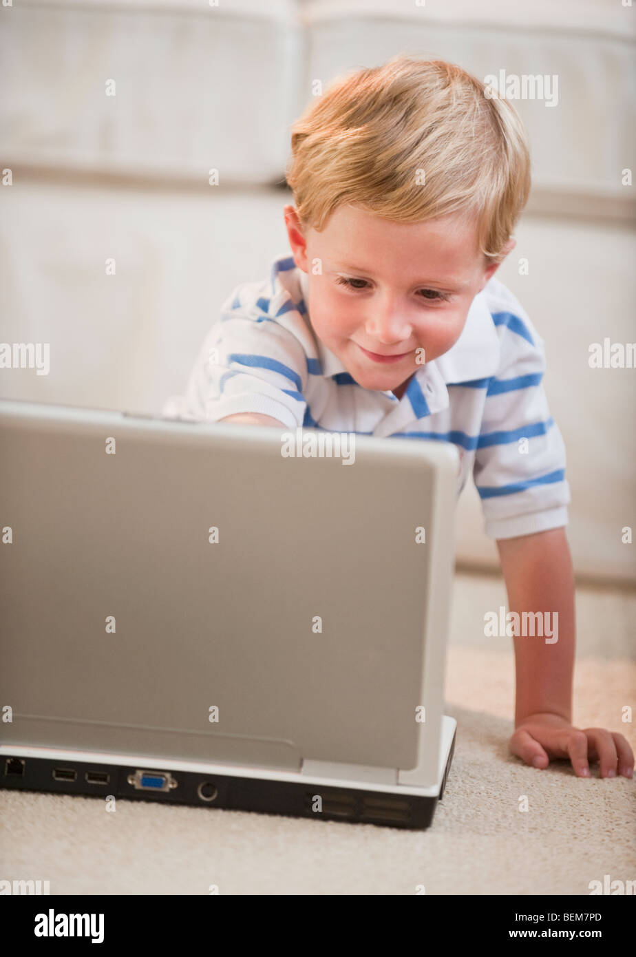 Child playing on computer Stock Photo - Alamy