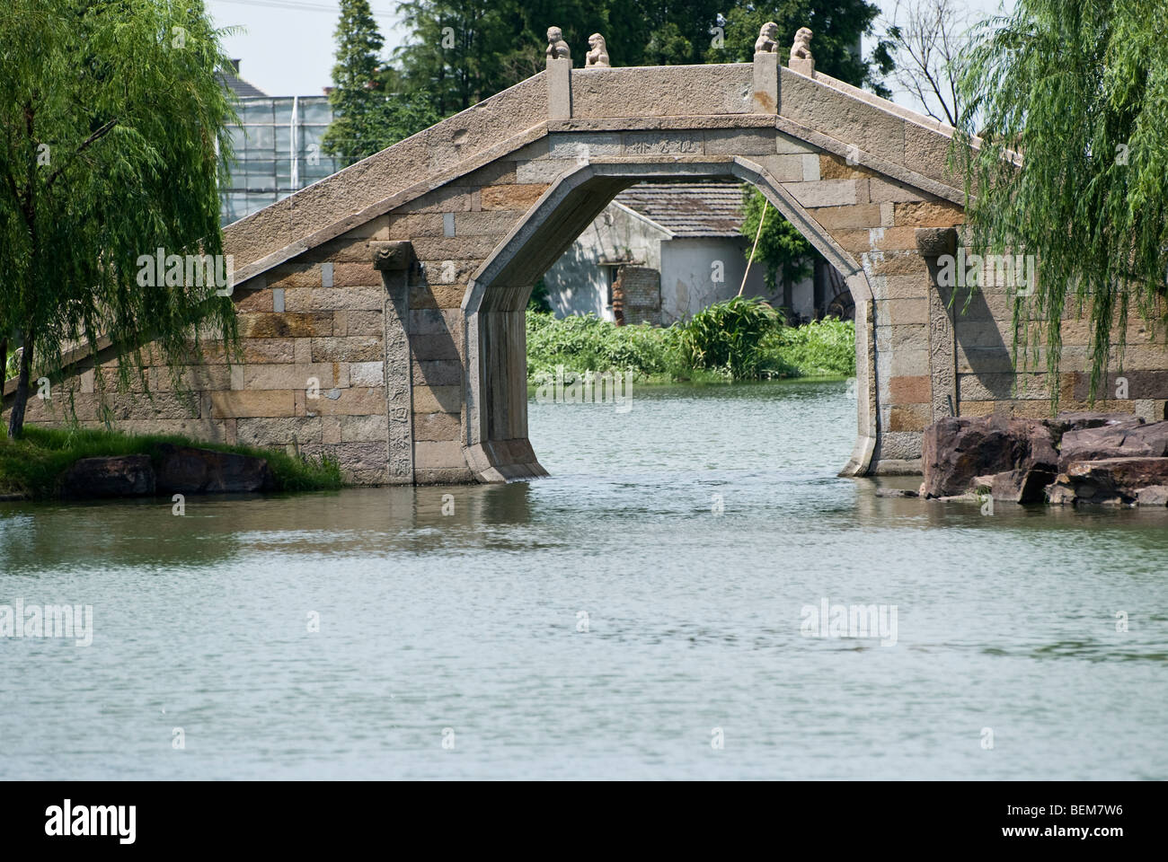 Ancient stone bridge with two willows Xitang is an ancient scenic town ...