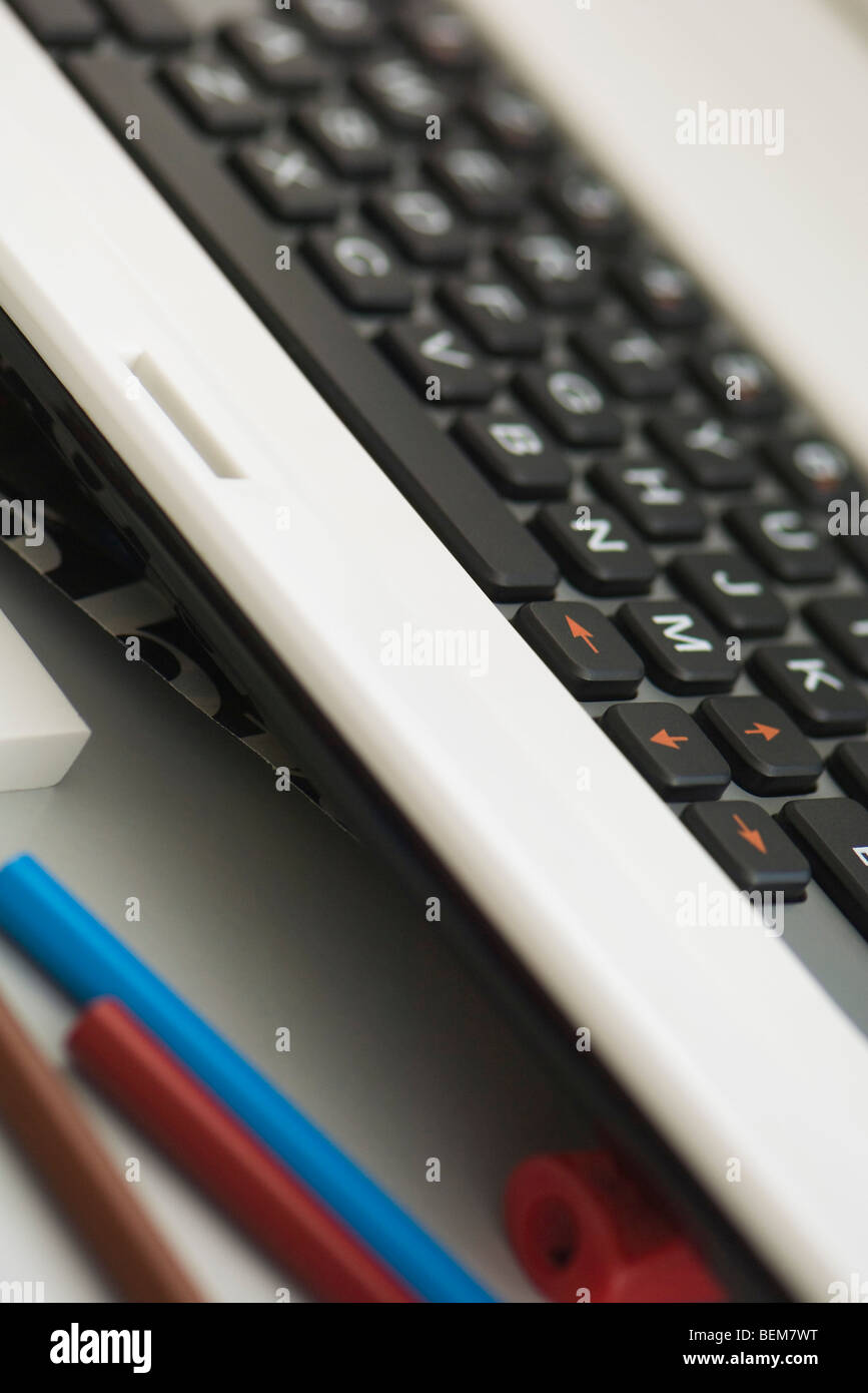 Computer keyboard and colored pencils, close-up Stock Photo - Alamy