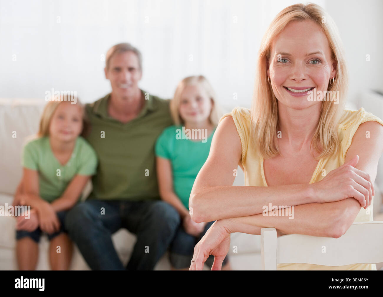 Family at home Stock Photo - Alamy