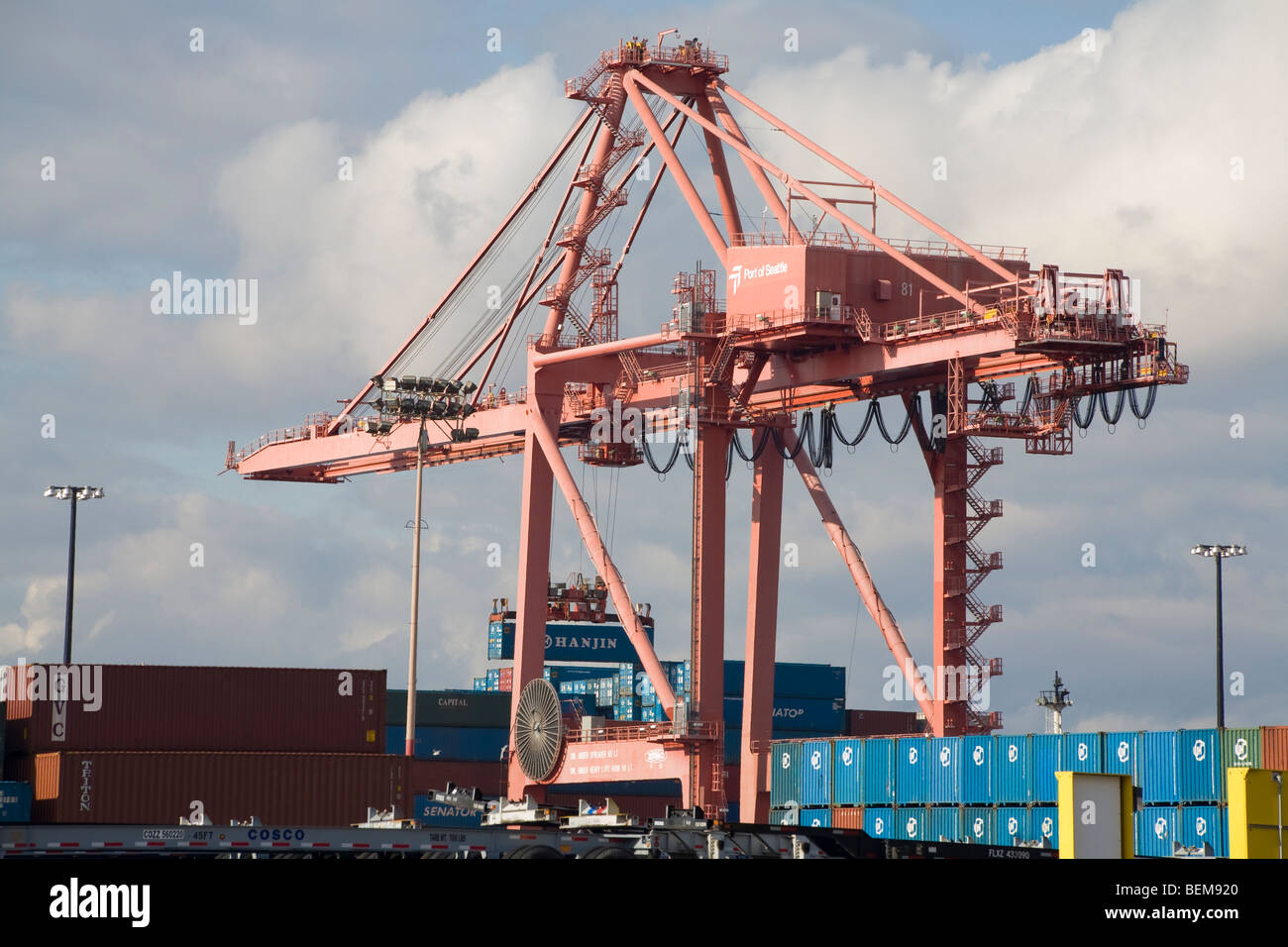 Shipping crane loading cargo containers at Port of Seattle. Seattle ...