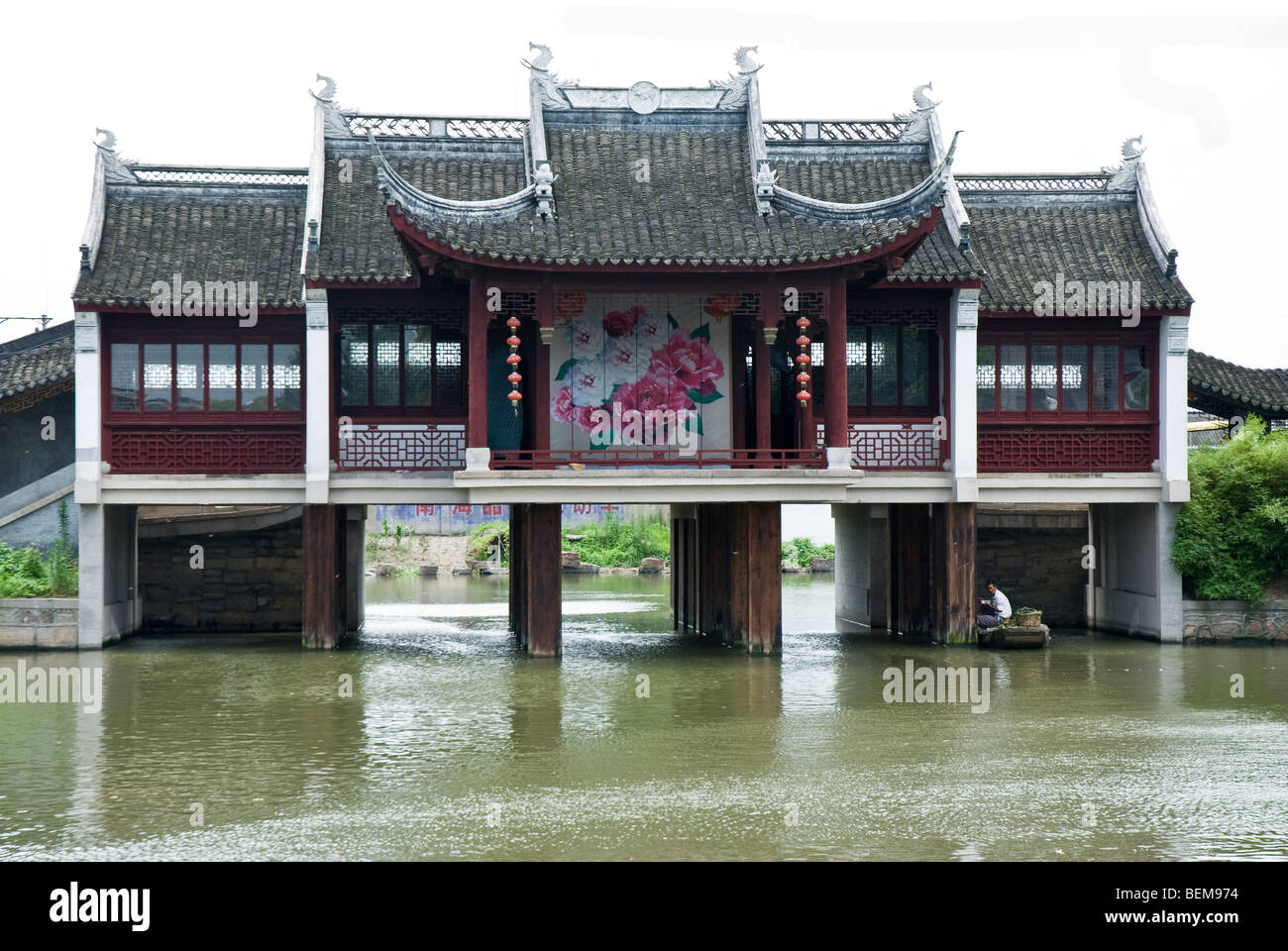 Old bridge building with typical Chinese roof. Xitang is an ancient ...