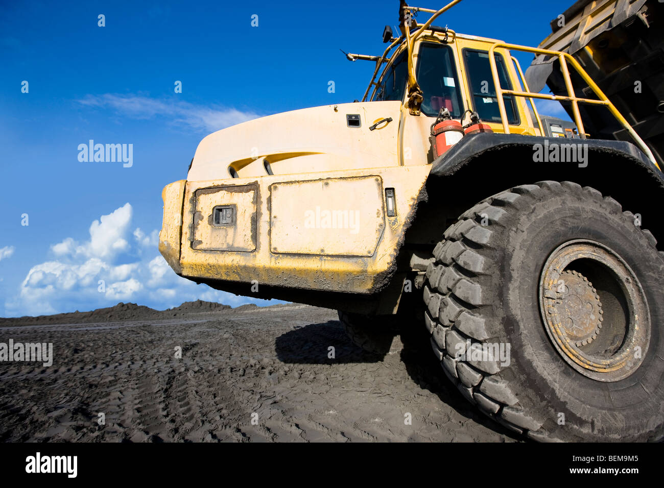 Large earthmoving machine on building site Stock Photo - Alamy