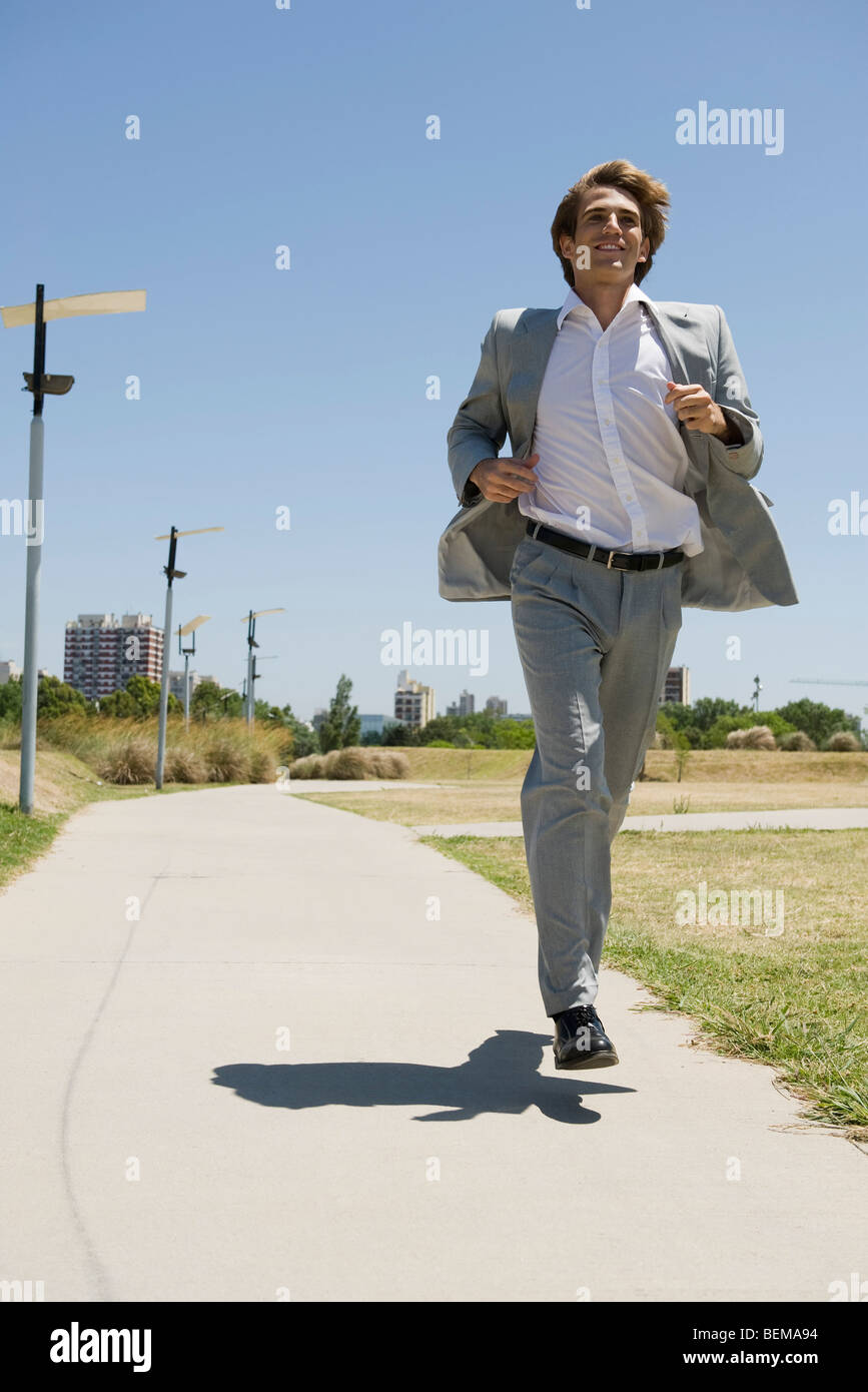 Running businessman hi-res stock photography and images - Alamy