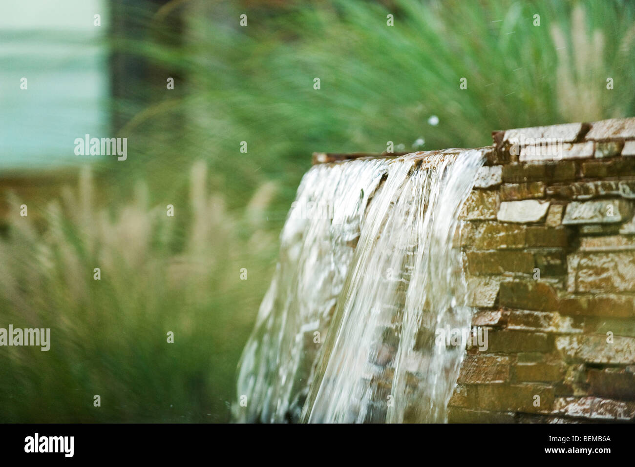 Water flowing over dam Stock Photo - Alamy