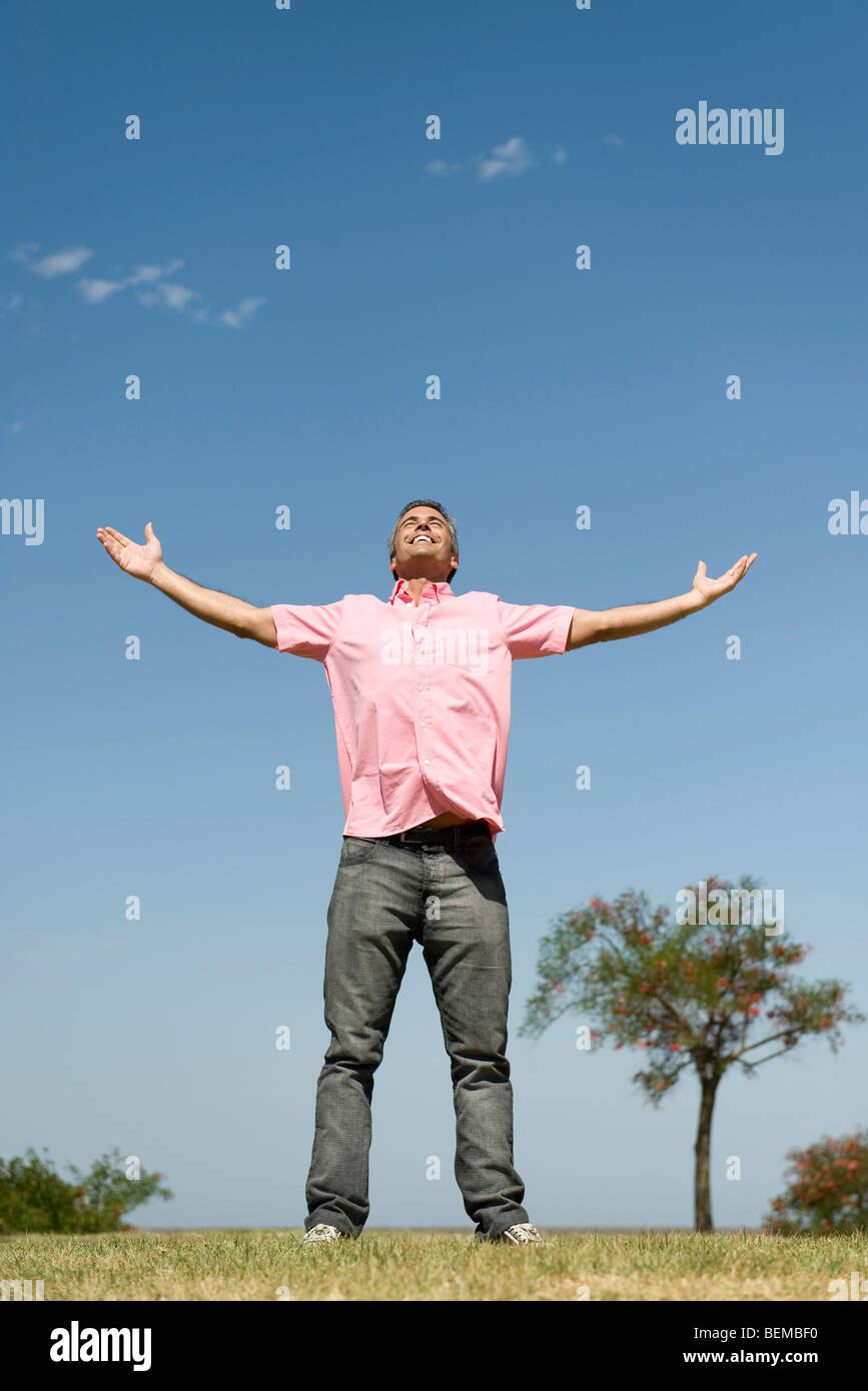 Man standing arms out hi-res stock photography and images - Alamy