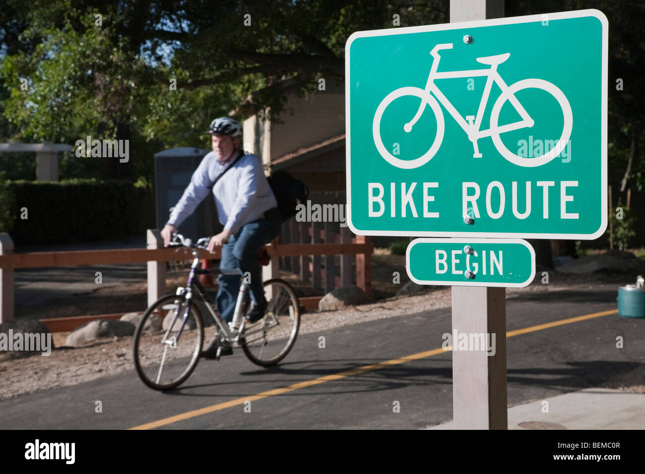 Bike route sign marks the path as a bicycle commuter exits the Stevens ...