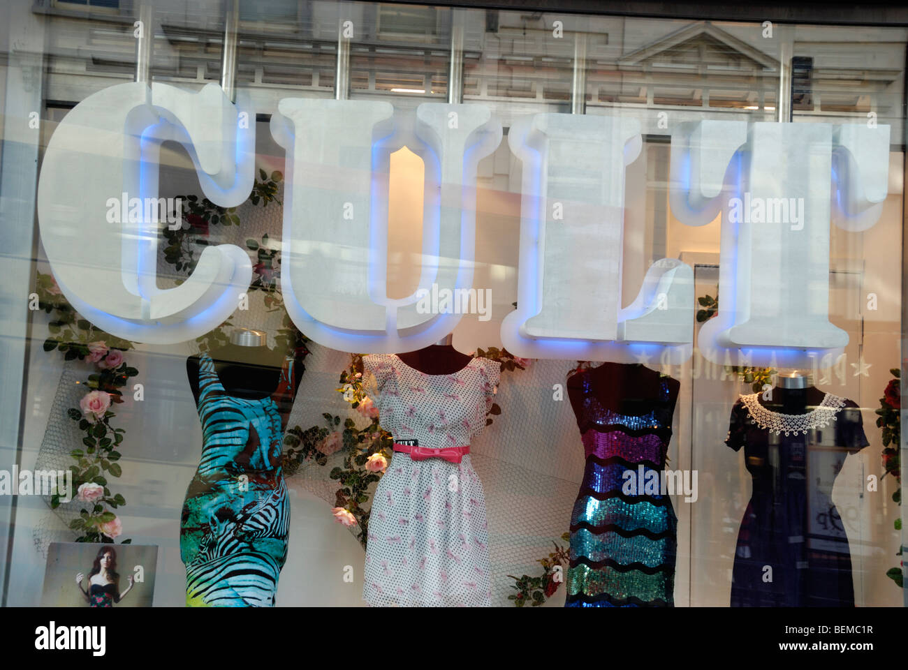 Cult sign in fashion shop window Stock Photo - Alamy