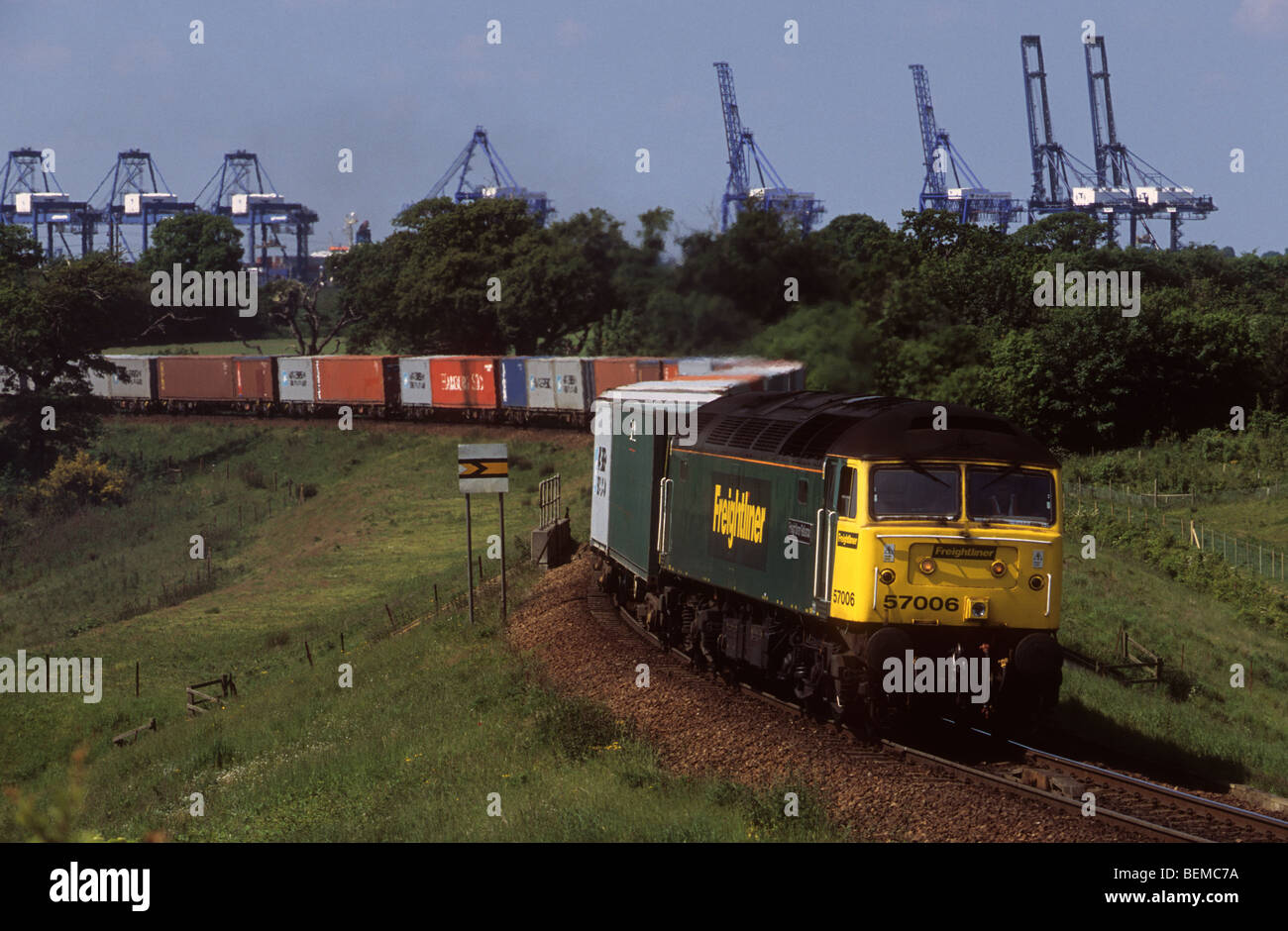 Freightliner class 57 diesel locomotive hauling containers out of the ...