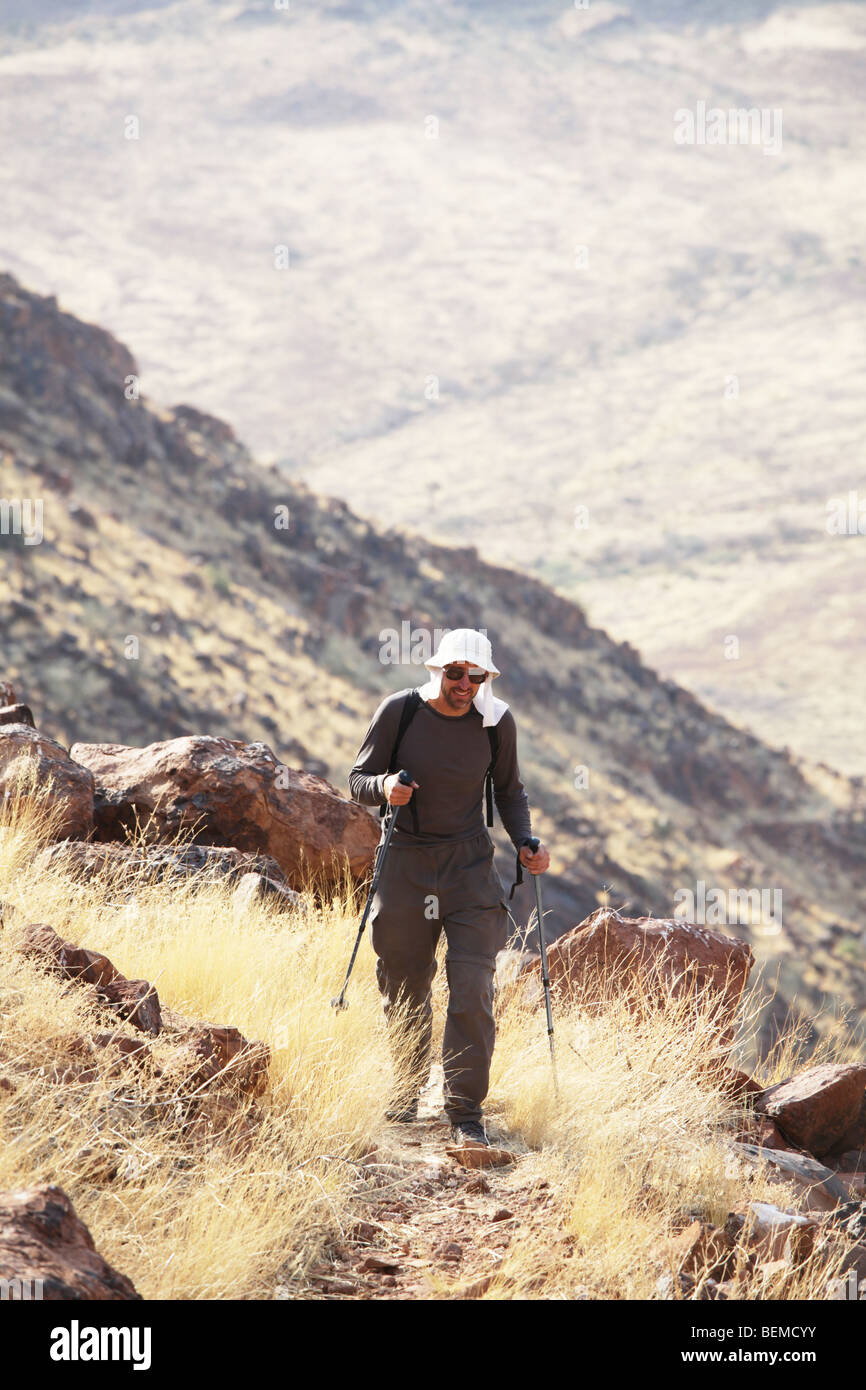 Hiker in mountains Stock Photo - Alamy