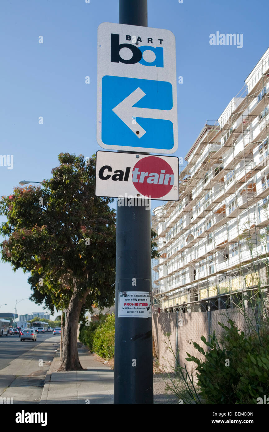 BART and Caltrain road signs near a transit oriented condo development ...
