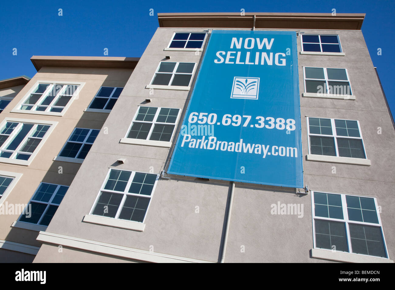 A close up of an advertising sign selling premises in a mixed used ...