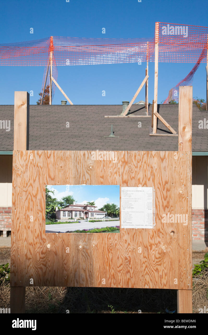 A signboard showing details of a new single family house construction ...