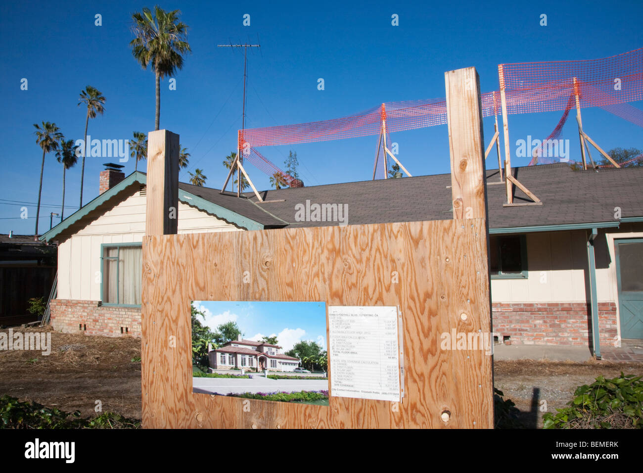 A signboard showing details of a new single family house construction ...