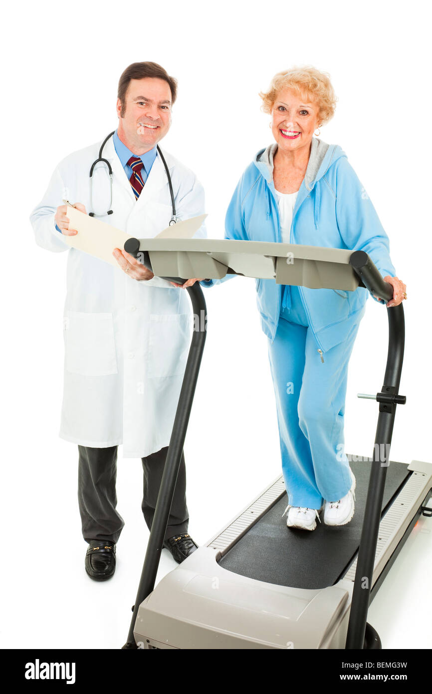 Senior woman on a treadmill being evaluated by her doctor. Isolated on ...
